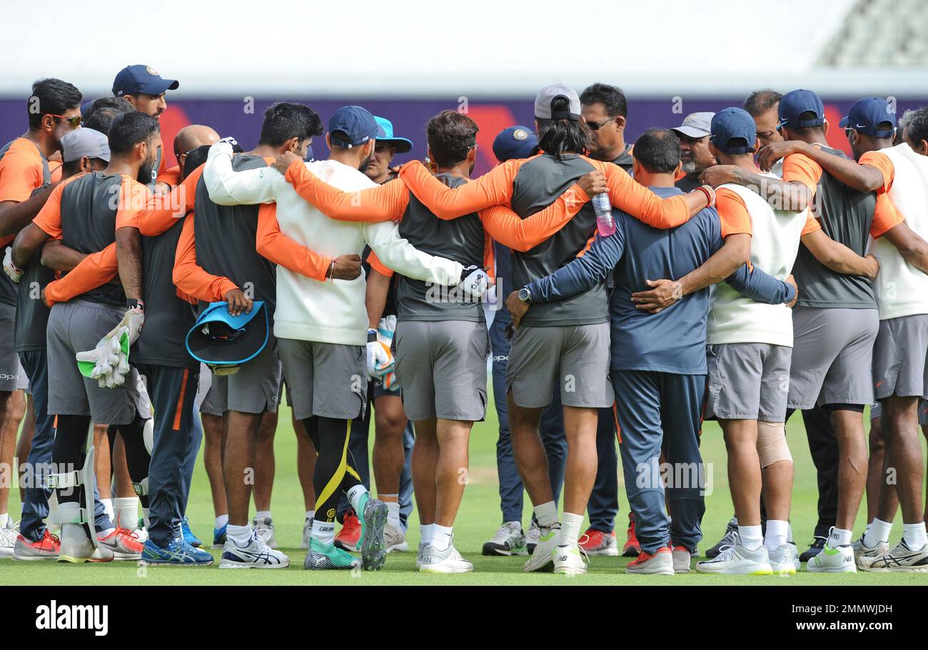 Members of the Indian cricket team huddle together before the start of ...