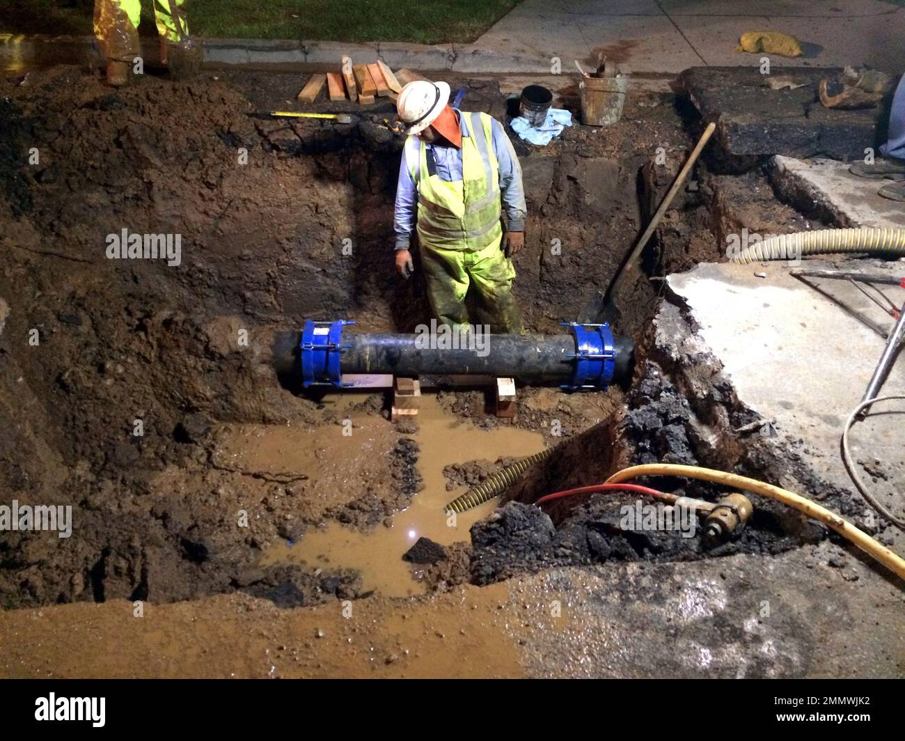 Los Angeles Department of Water and Power (DWP) workers install a ...