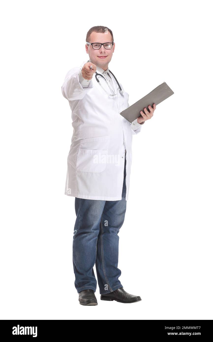Side view of concentrated male doctor writing reports over white ...
