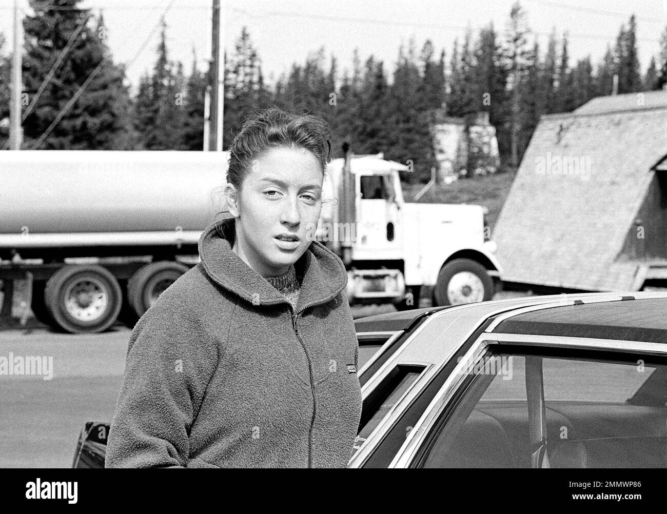 Molly Schula, 17, watches as bodies of three classmates were flown from ...