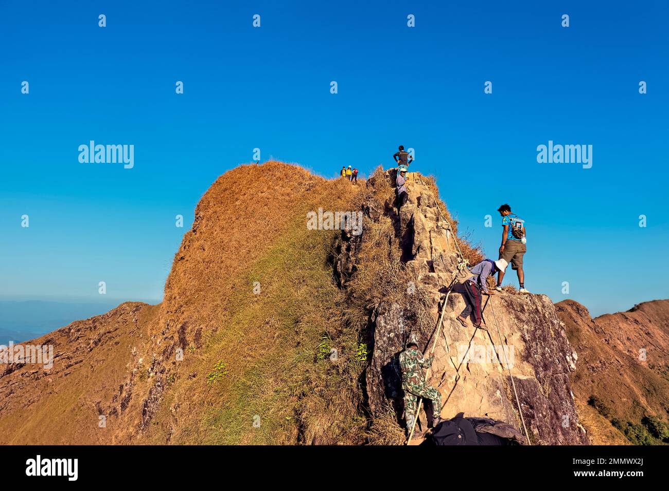 Climbing up the knife-edge ridge on Khao Chang Phueak, Thong Pha Phum ...