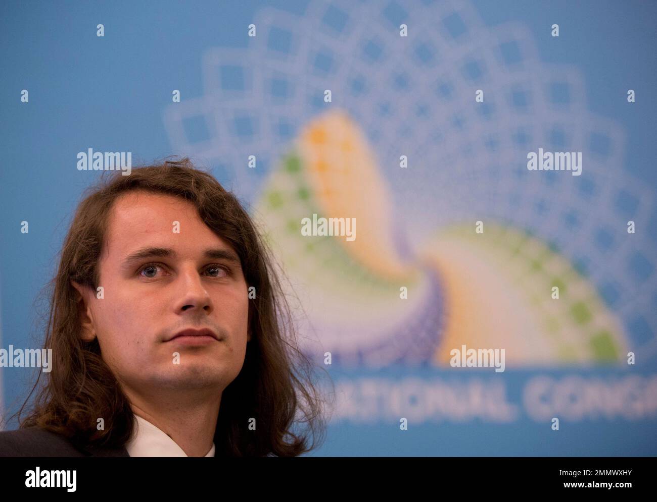 Germany's Peter Scholze listens to a question during a press conference ...