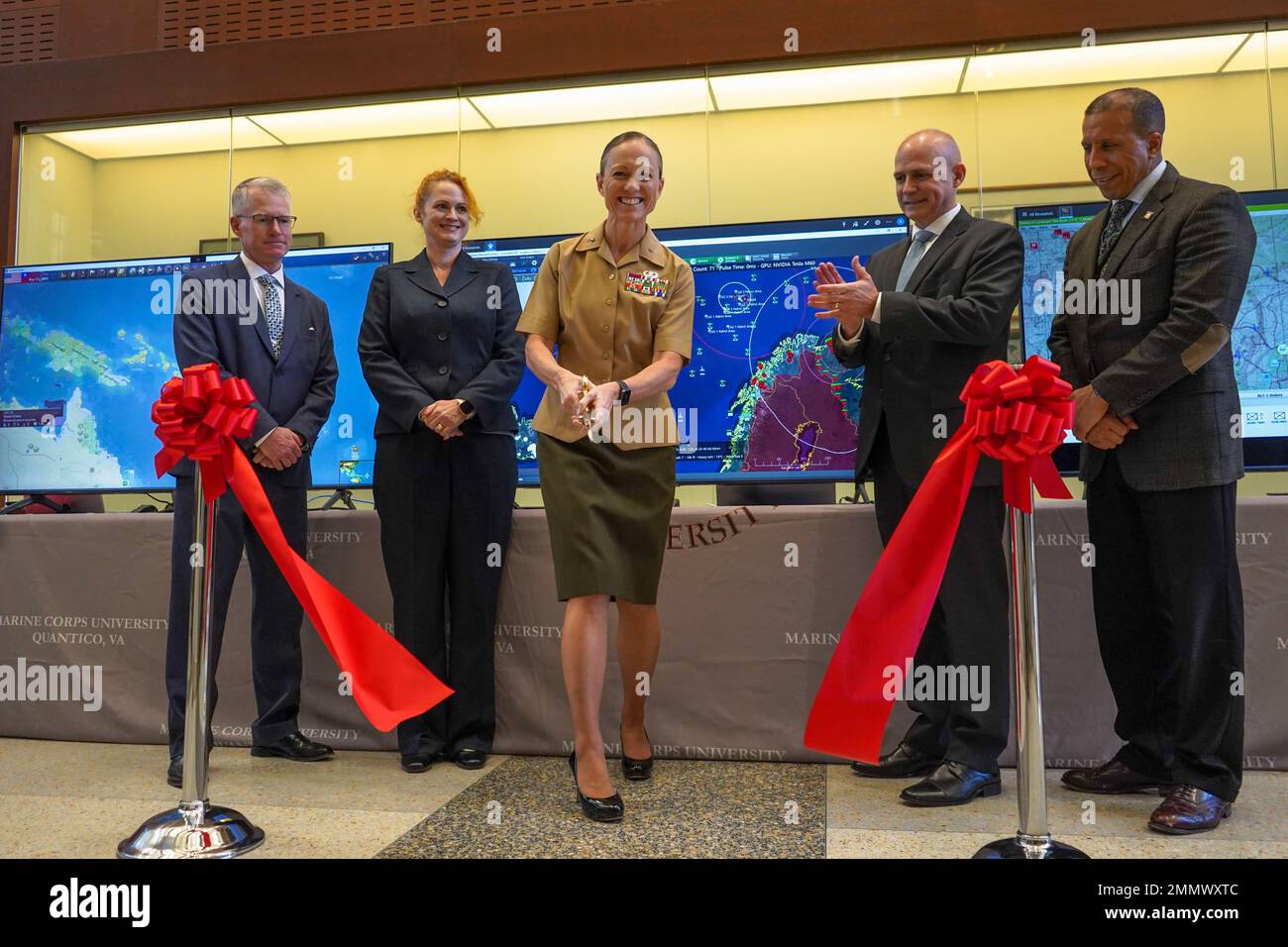 Keil Gentry, Vice President for Business Affairs, left, Rebecca Johnson, provost, Marine Corps ...