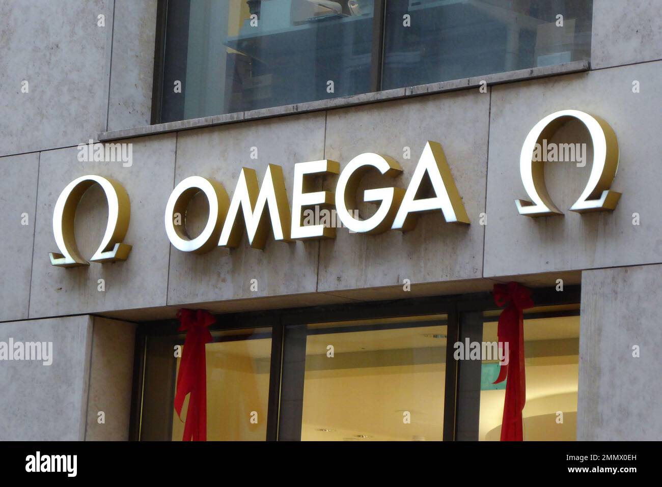 Omega / Store / Logo / Uhrenmarke / Swatch Group Stock Photo - Alamy