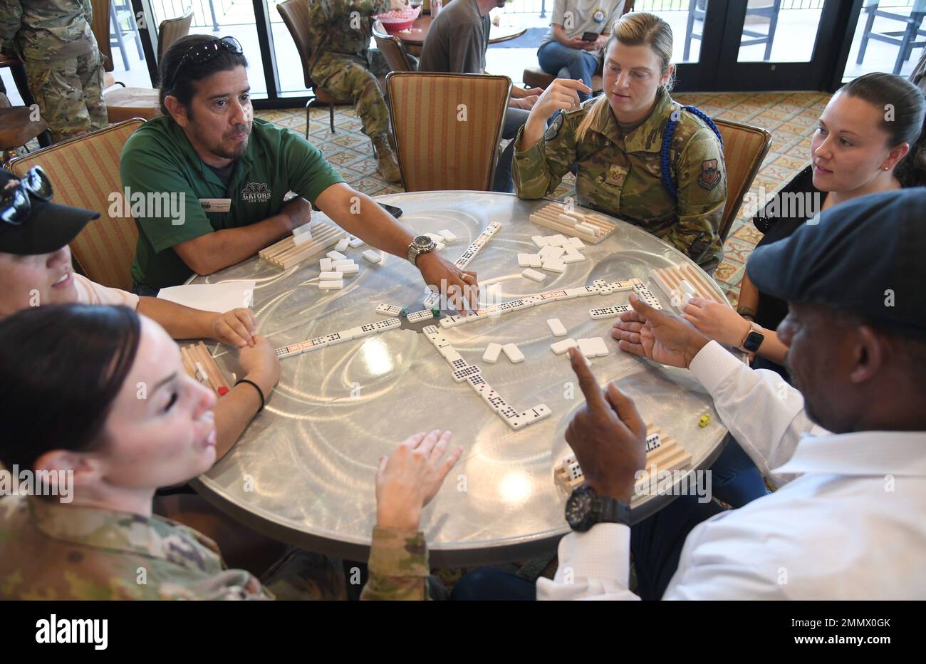 Keesler personnel play a game of dominos during the Hispanic Heritage ...