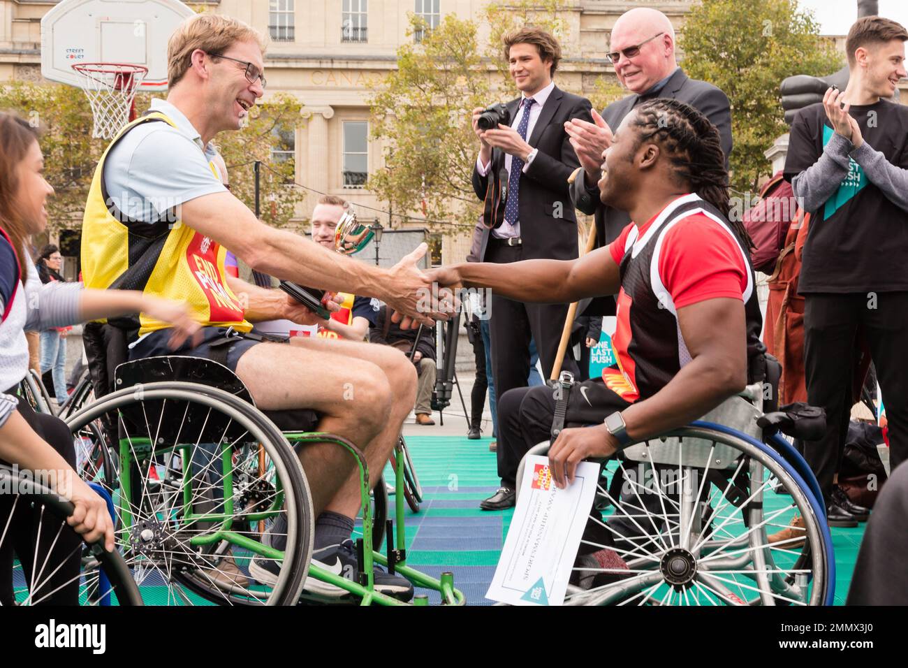 Conservative MP Tobias Ellwood with polio survivor and wheelchair ...