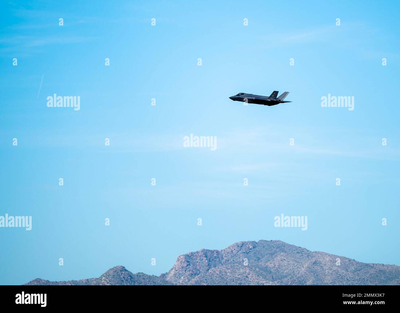 An F-35A Lightning II aircraft soars over the flightline Sept. 23, 2022 ...