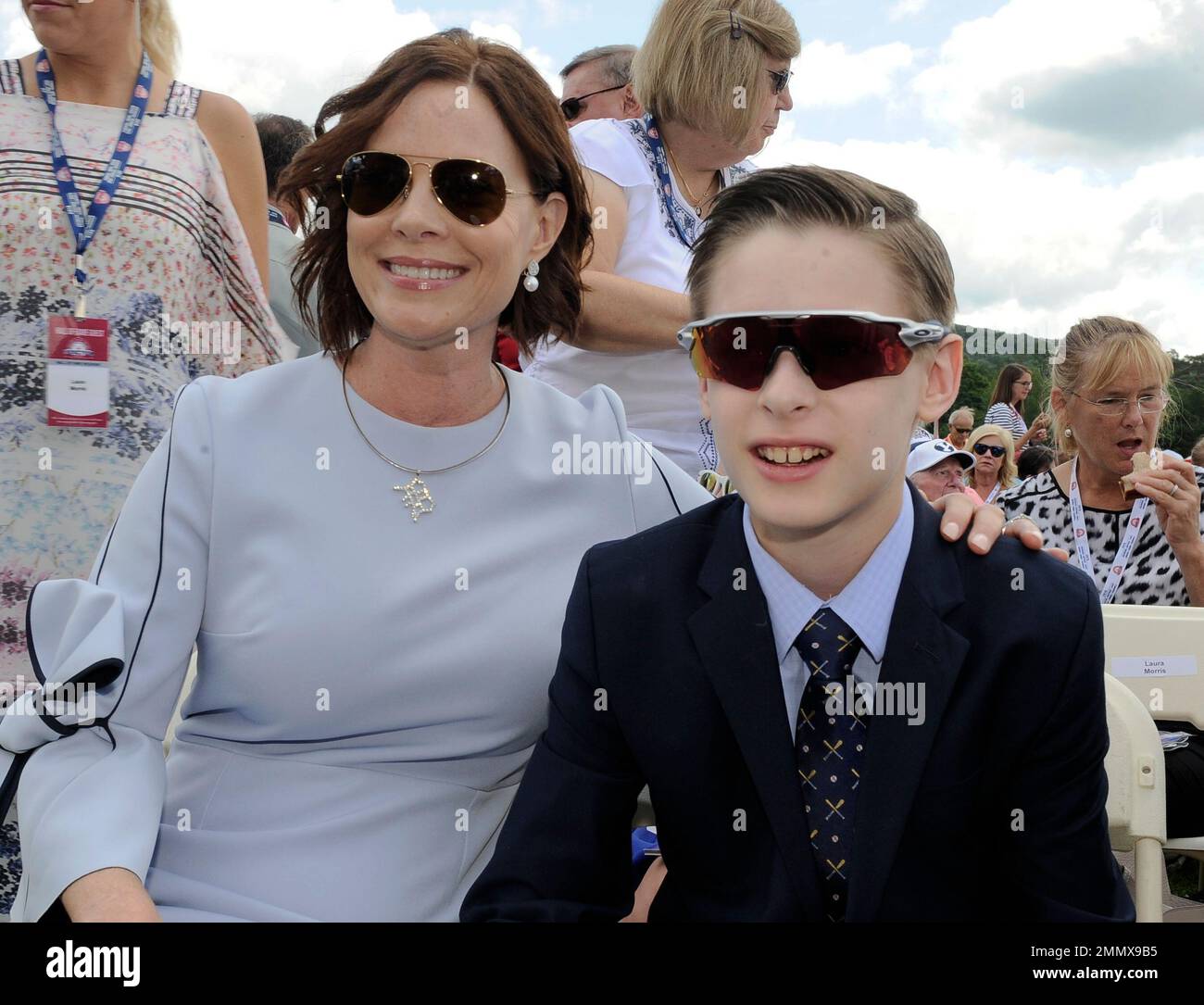 Jennifer Morris and her son Miles Morris watch as her husband National ...