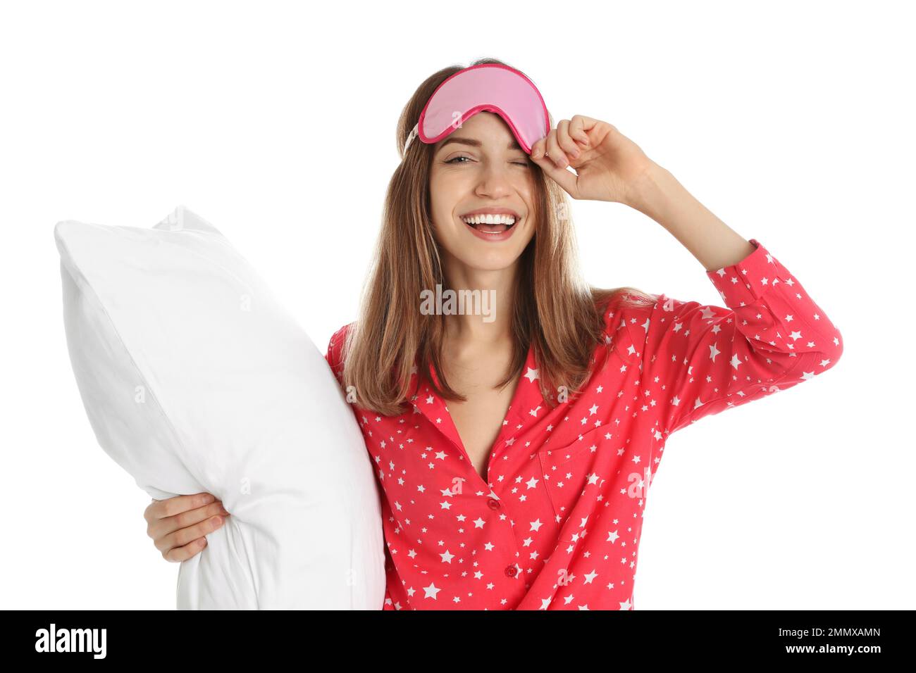 Beautiful woman with pillow and sleep mask on white background. Bedtime ...