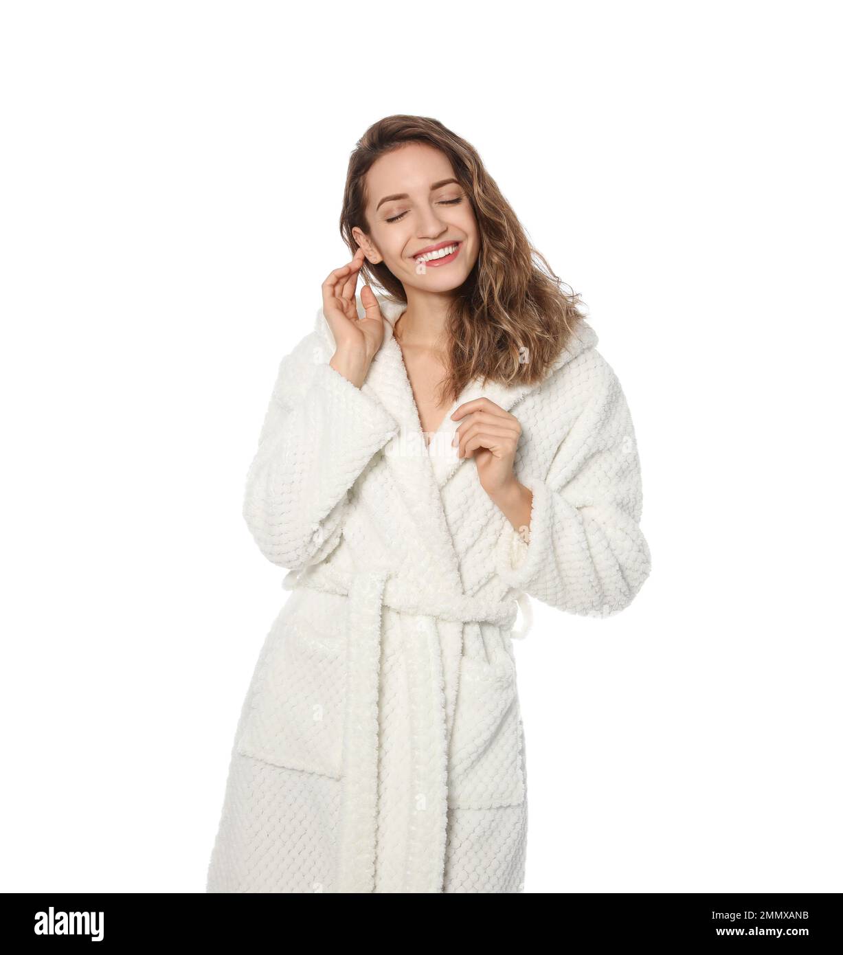 Beautiful young woman wearing bathrobe on white background Stock Photo ...