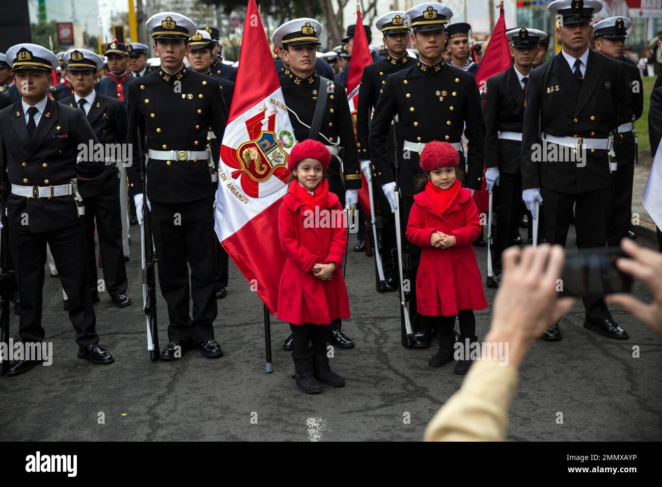 Sasha Quitoran and her sister Chantal, both age 5, pose for a picture ...