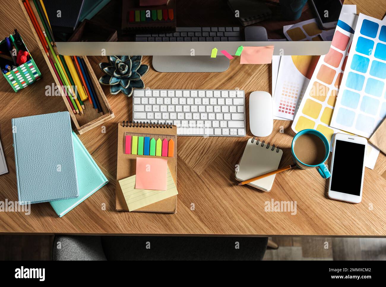Designer's workplace with modern computer and color palettes, flat lay ...