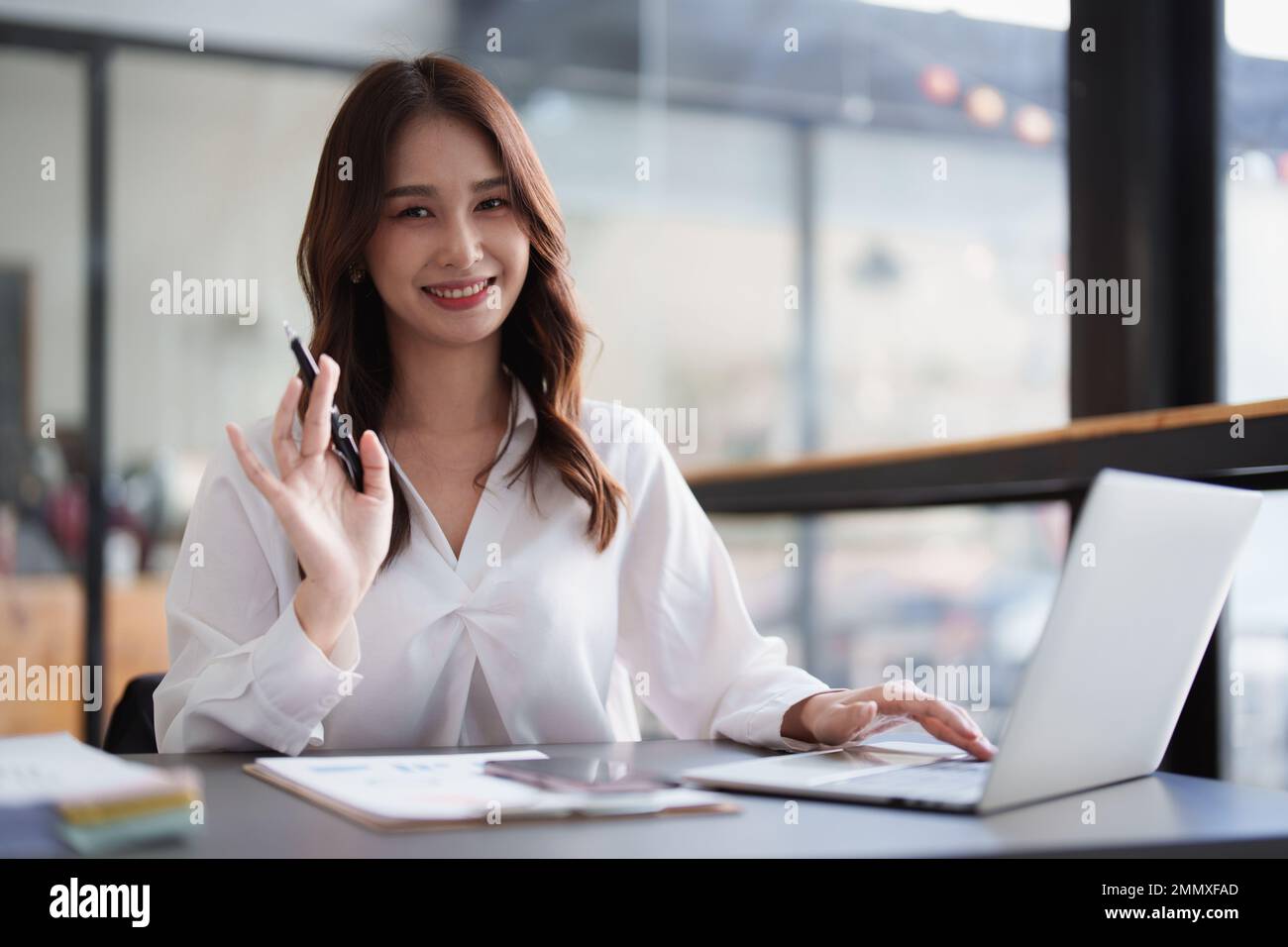 Portrait of business accountant using laptop for analyze financial data ...