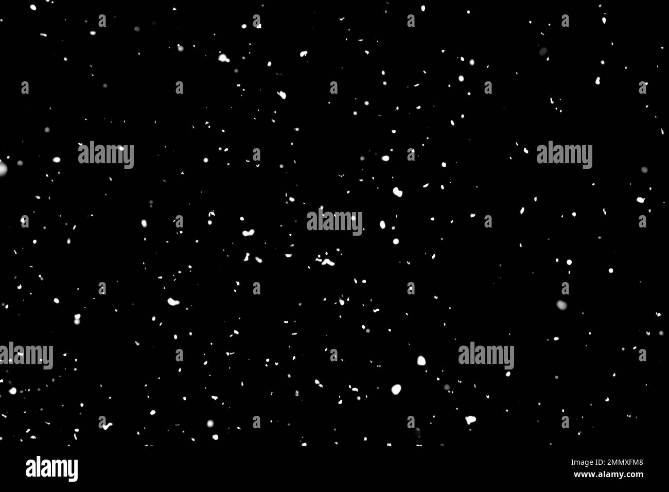 White snow falling down on black background Stock Photo - Alamy