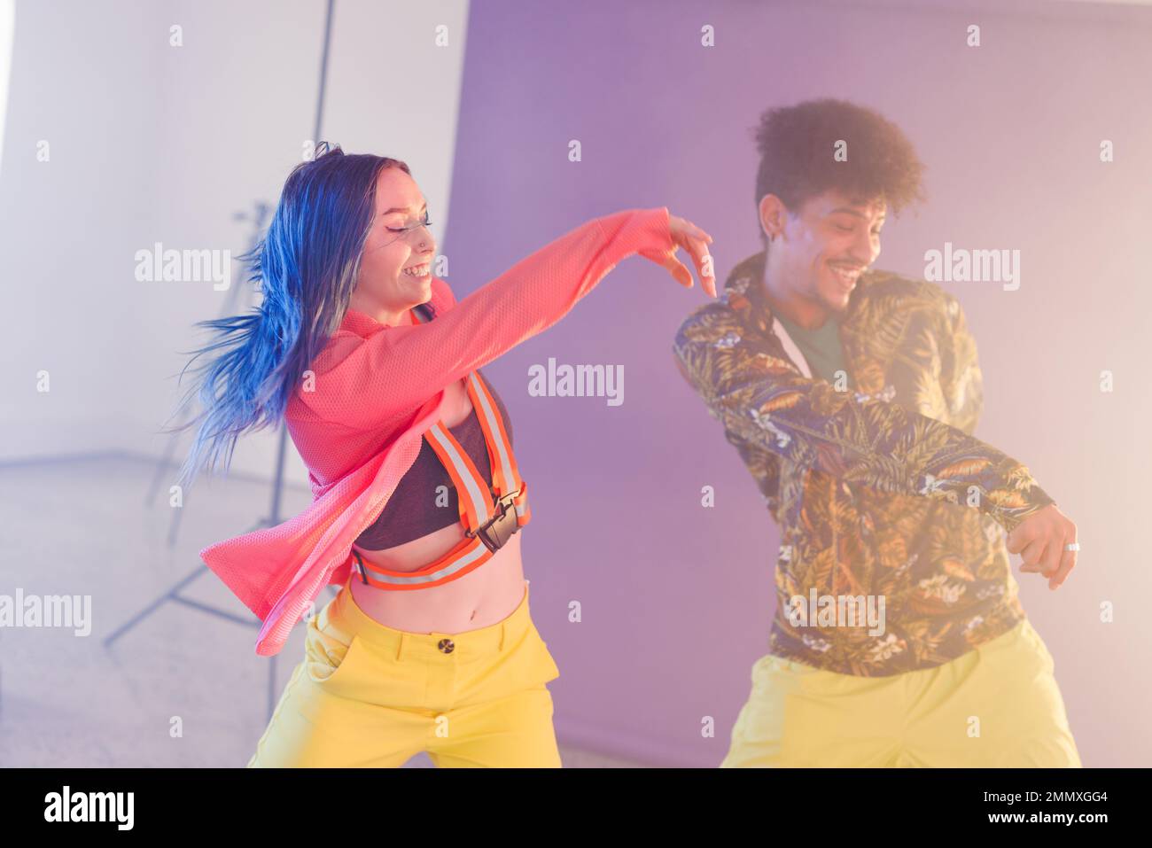 Image of happy diverse female and male hip hop dancers in studio. Dance ...