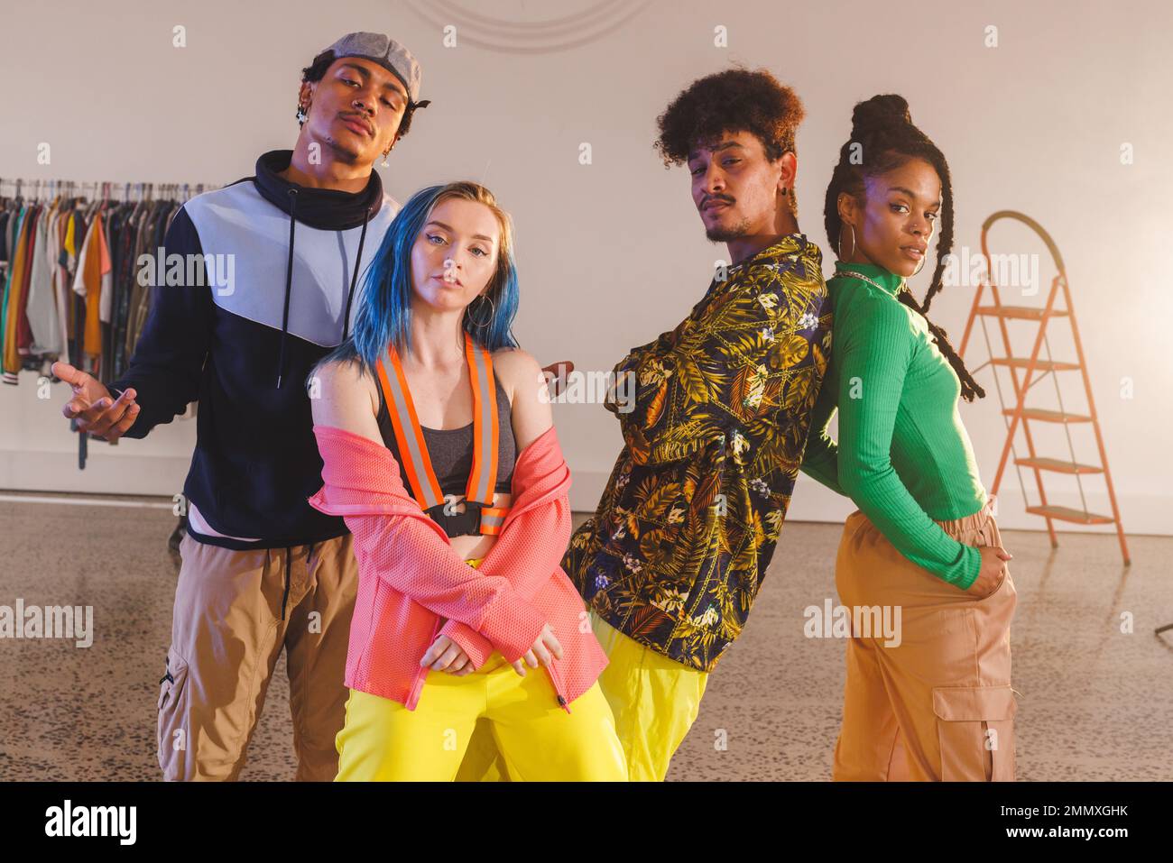 Image of diverse female and male modern dancers posing in studio. Dance ...