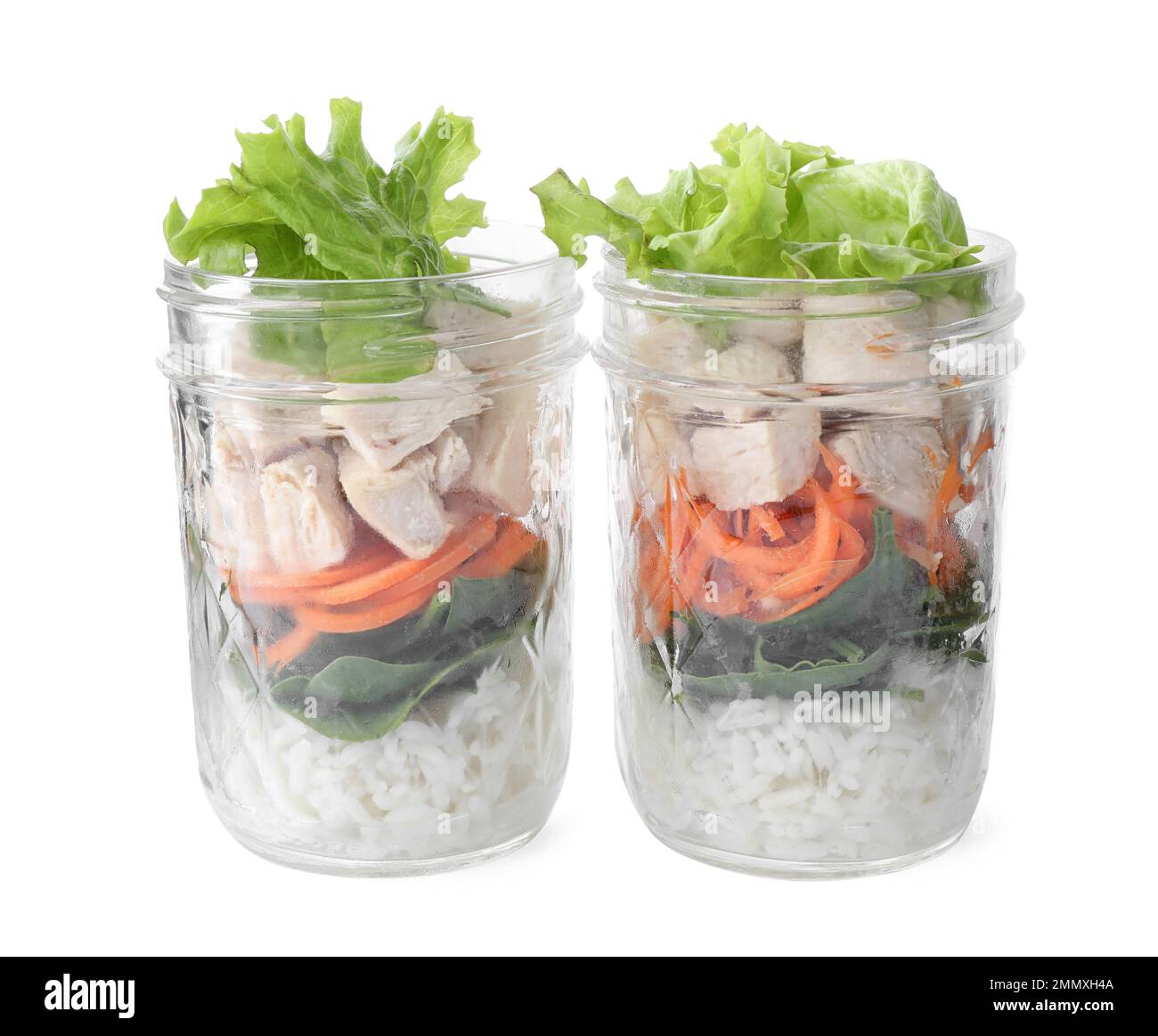 Healthy salad in glass jars isolated on white Stock Photo - Alamy