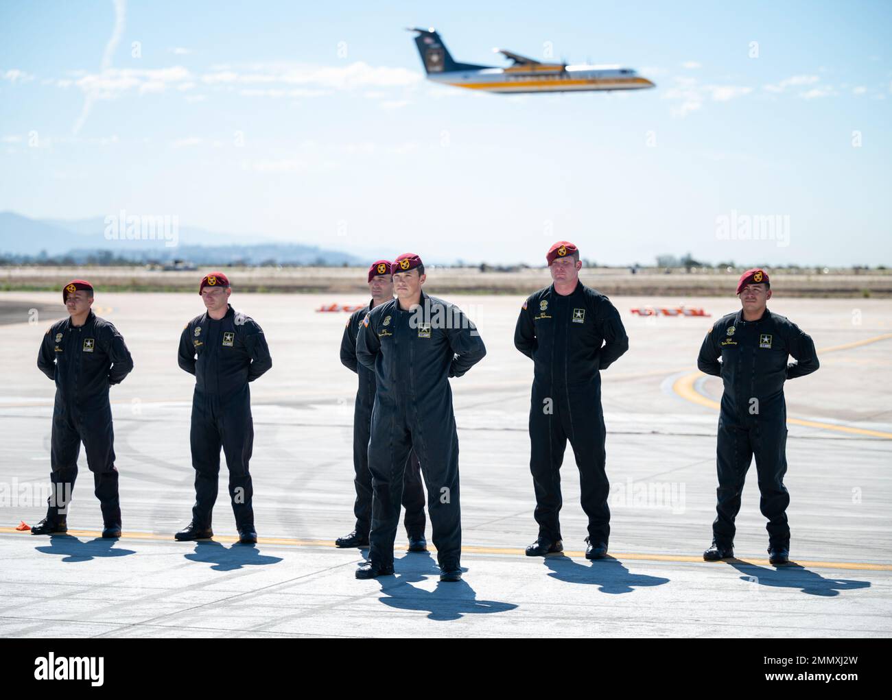 The U.S. Army Parachute Team, nicknamed the Golden Knights, stand at ...