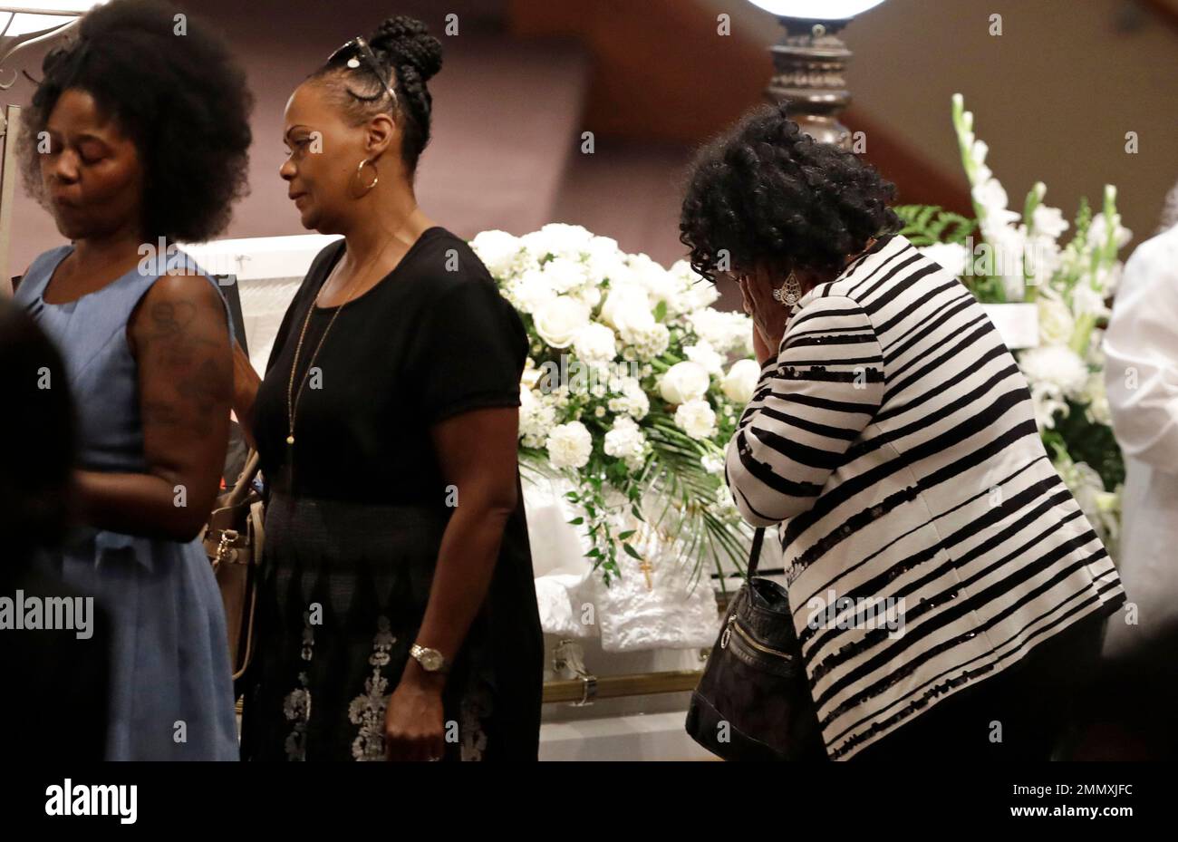 Guest arrive for the showing for Horace Coleman, Belinda Coleman, Irvin ...