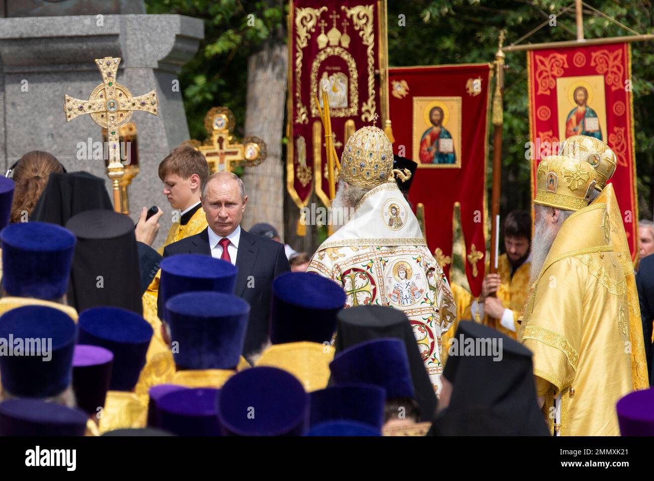 Russian President Vladimir Putin, center, attends a ceremony marking ...