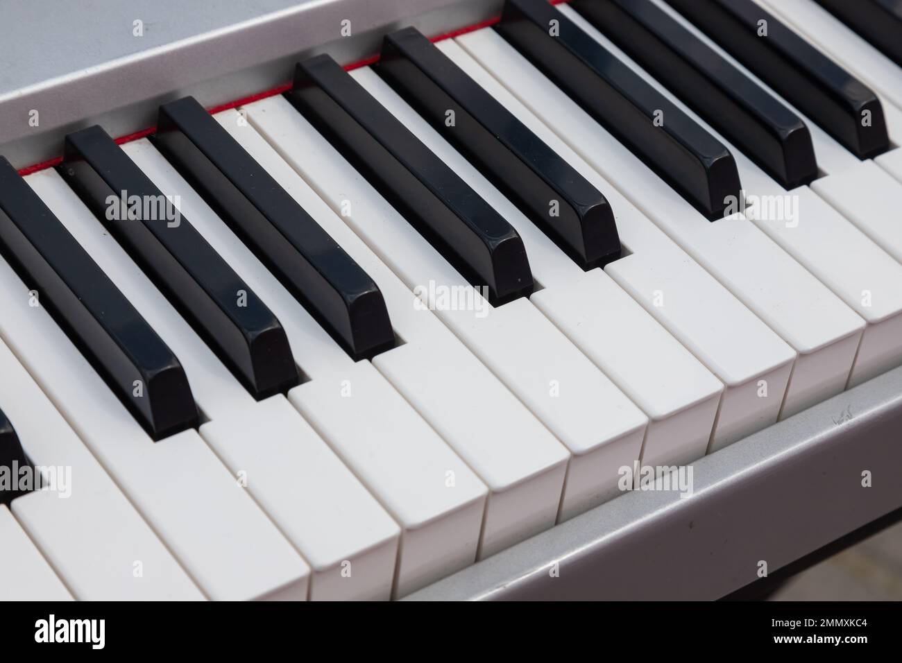 close-up of piano keys. close frontal view, black and white piano keys ...