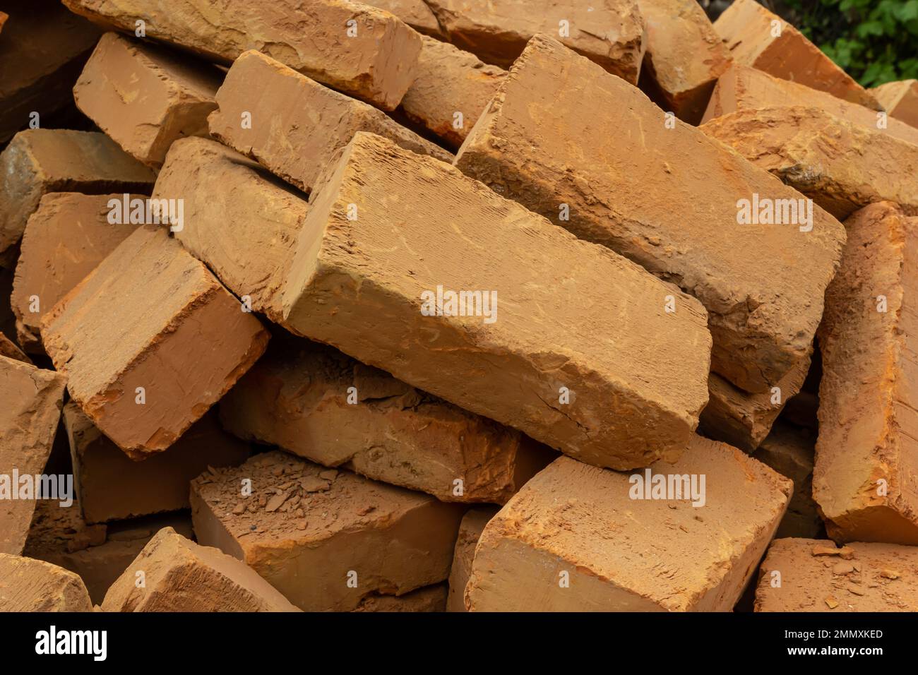 Solid clay brick used for construction. Background, brown red color ...