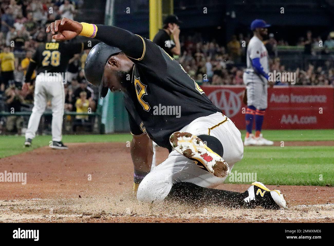 Pittsburgh Pirates' Gregory Polanco scores the second of two runs ...