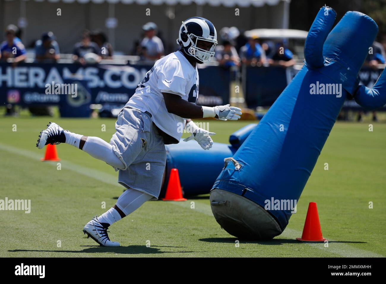 Los Angeles Rams defensive tackle Tanzel Smart runs a drill during NFL ...