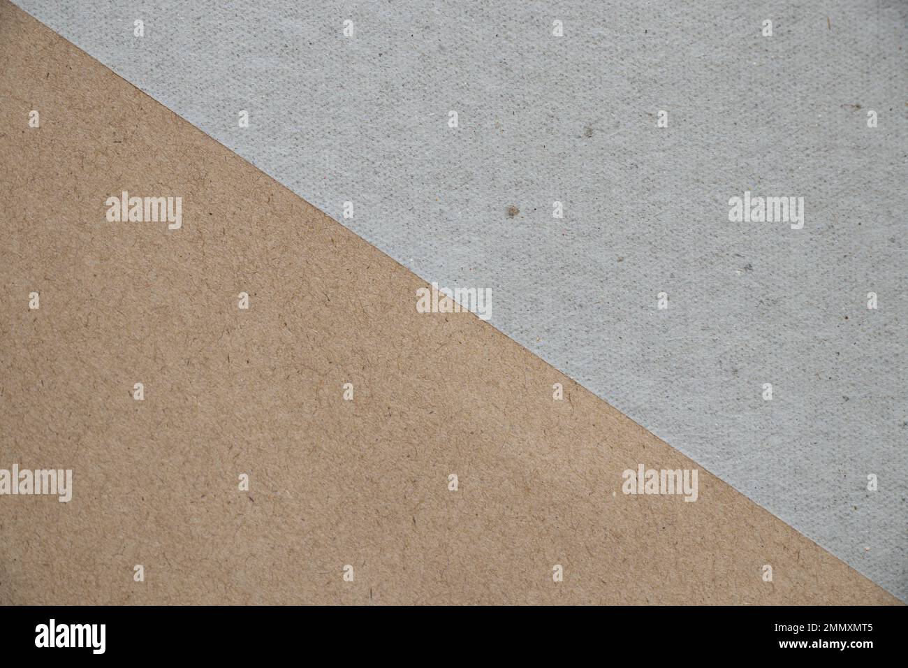 gray-brown cardboard as a paper background, two sheets of different ...