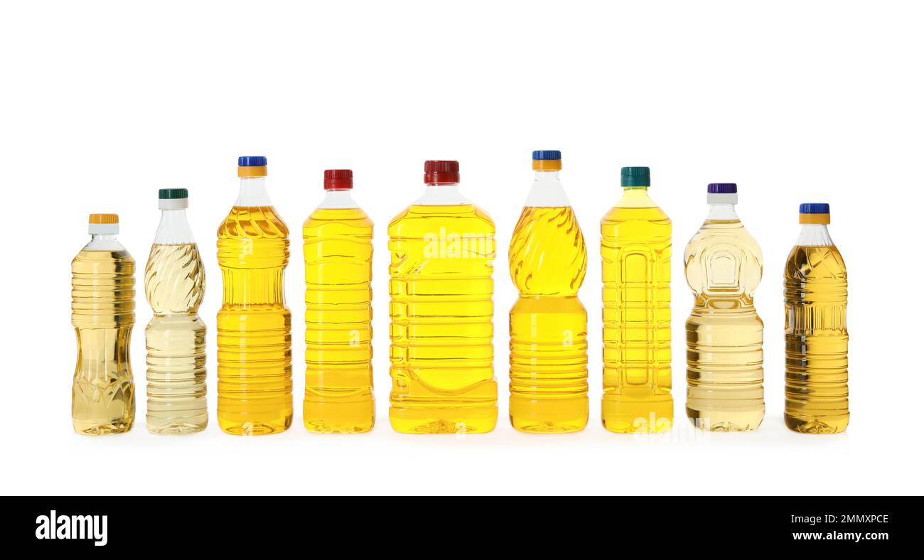 Cooking oil in different bottles isolated on white Stock Photo - Alamy