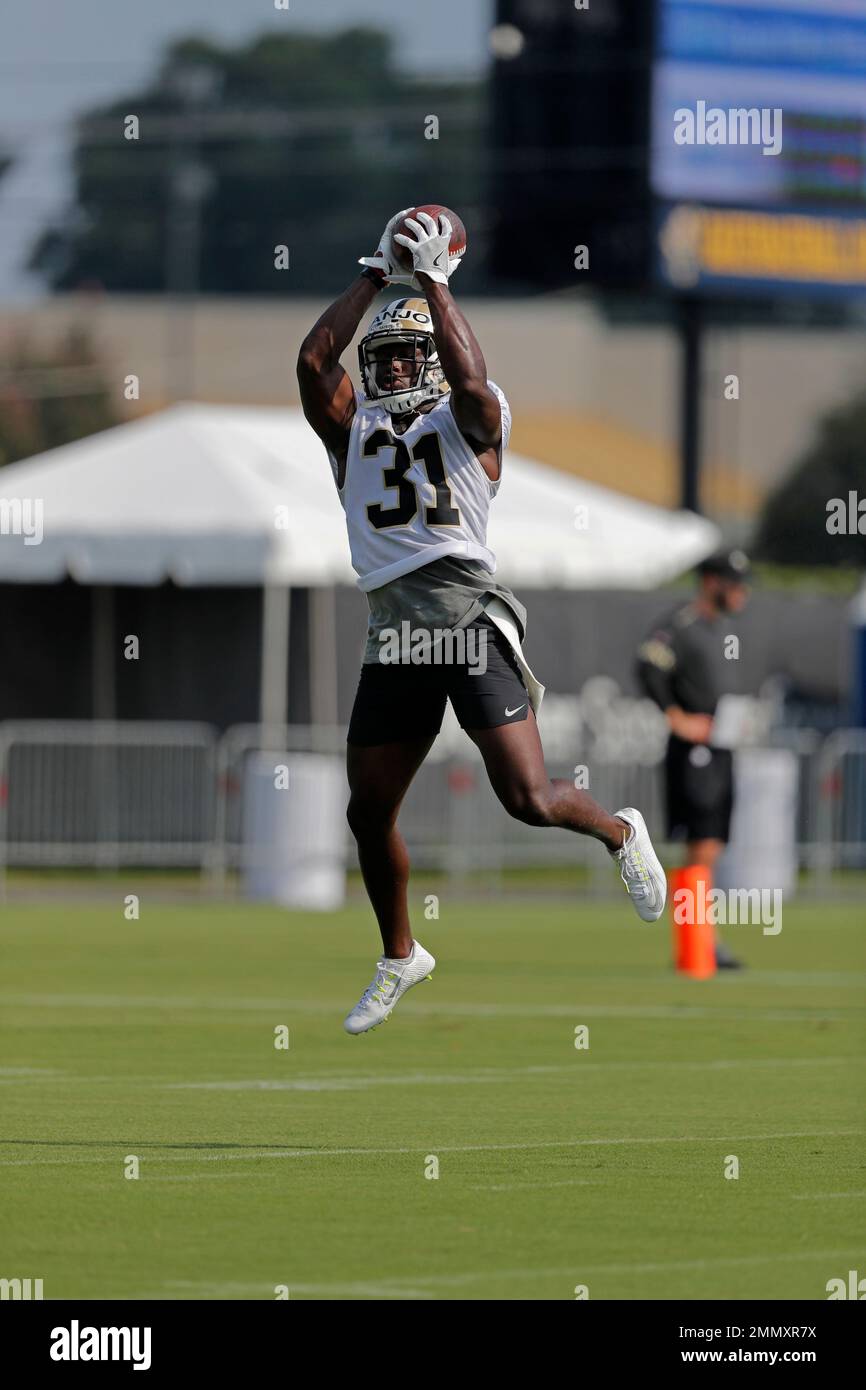New Orleans Saints safety Chris Banjo (31) goes through drills during ...