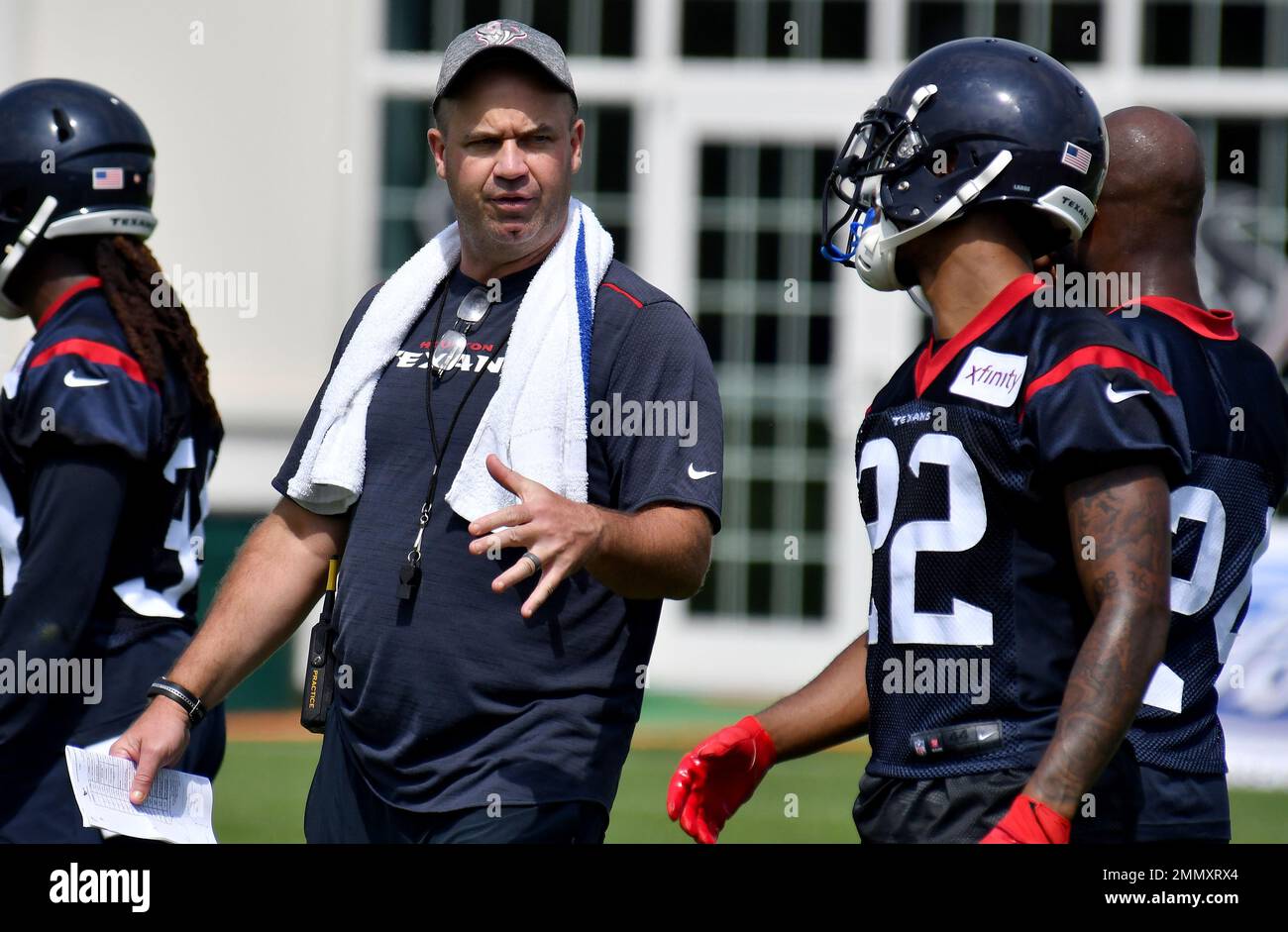 Houston Texans head coach Bill O'Brien talks with cornerback Aaron ...
