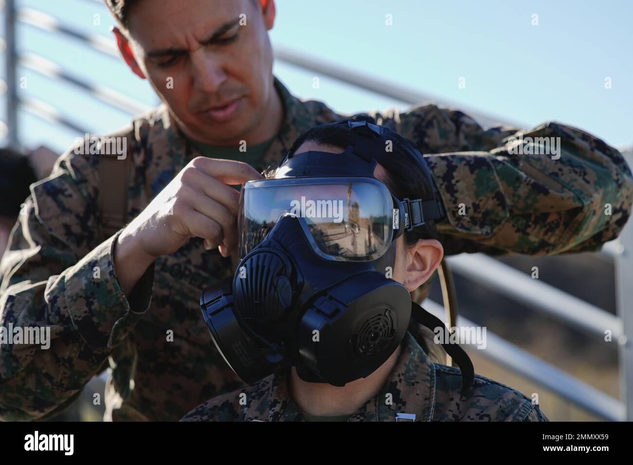 U.S. Marines assigned to the 15th Marine Expeditionary Unit fit their ...
