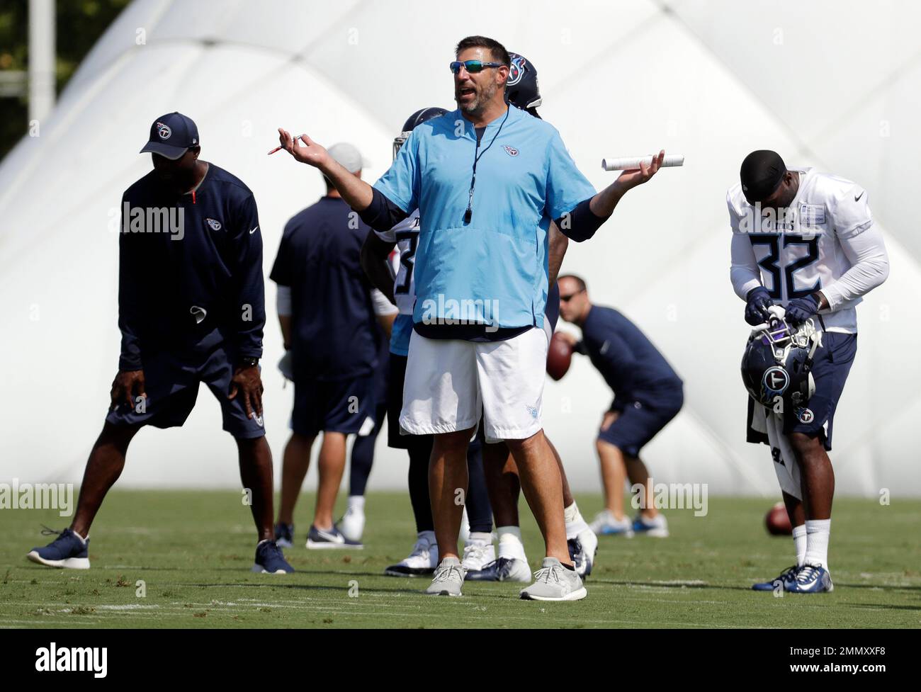 Tennessee Titans head coach Mike Vrabel, center, watches during NFL ...
