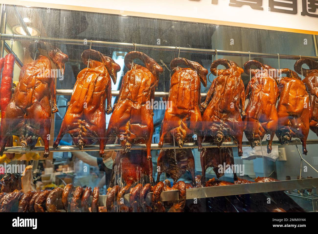 Hong Kong - December 2022 - Ducks on display at restaurant Stock Photo ...
