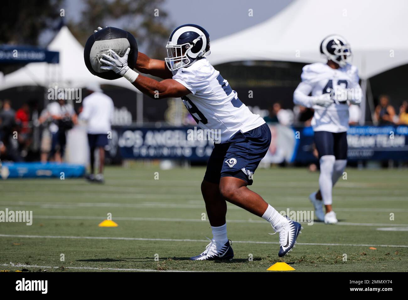 Los Angeles Rams linebacker Micah Kiser runs a drill during NFL ...