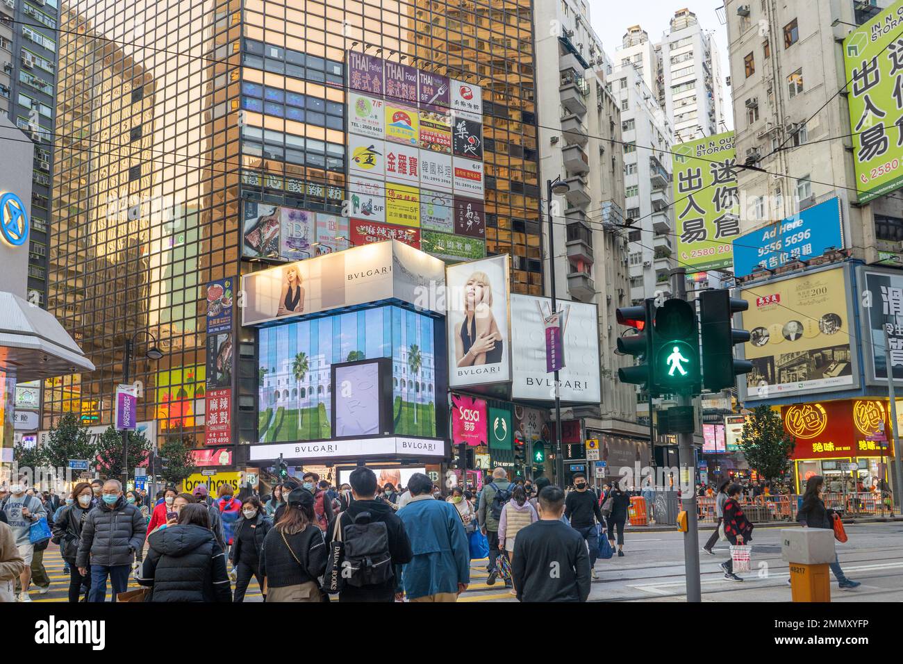 Busy street intersection and zebra crossing in Causeway Bay Hong Kong ...