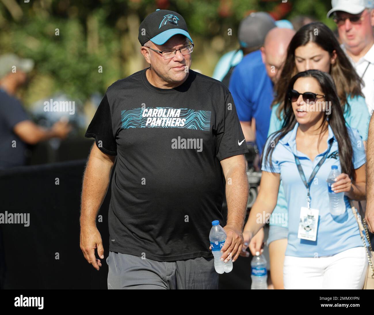 Carolina Panthers owner David Tepper walks around the field during an ...