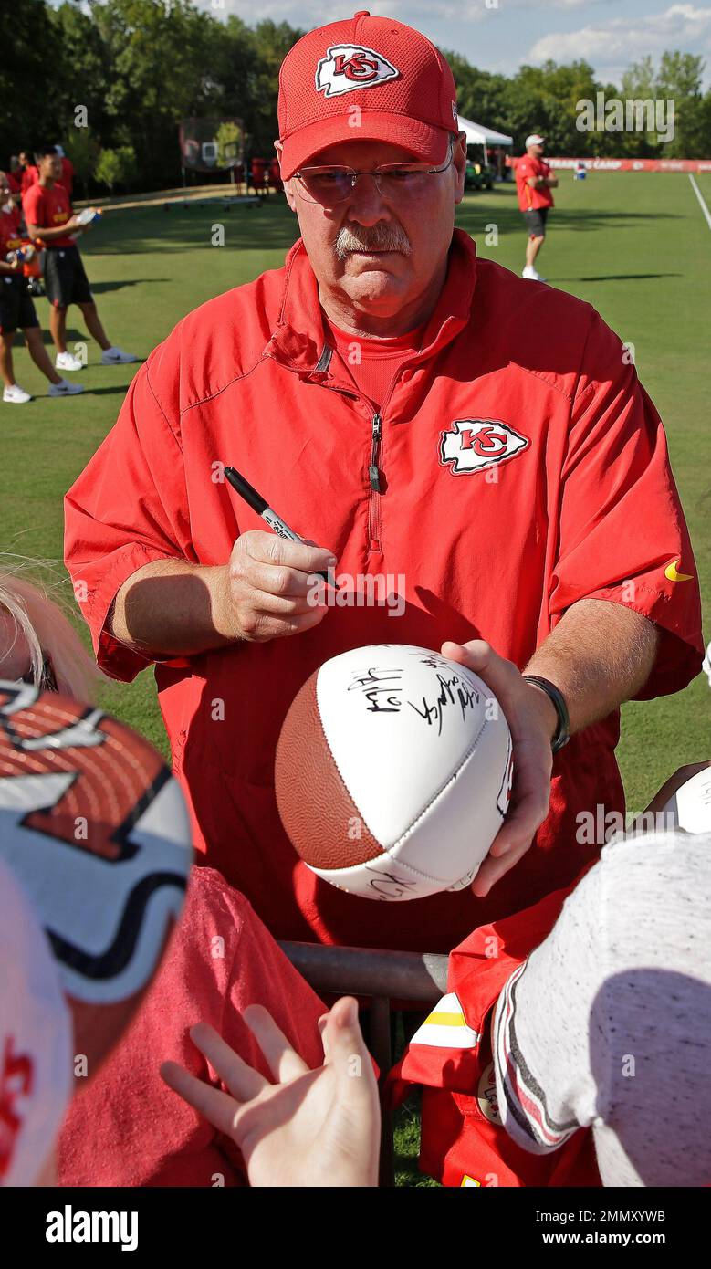 Kansas City Chiefs coach Andy Reid signs autographs during NFL football ...