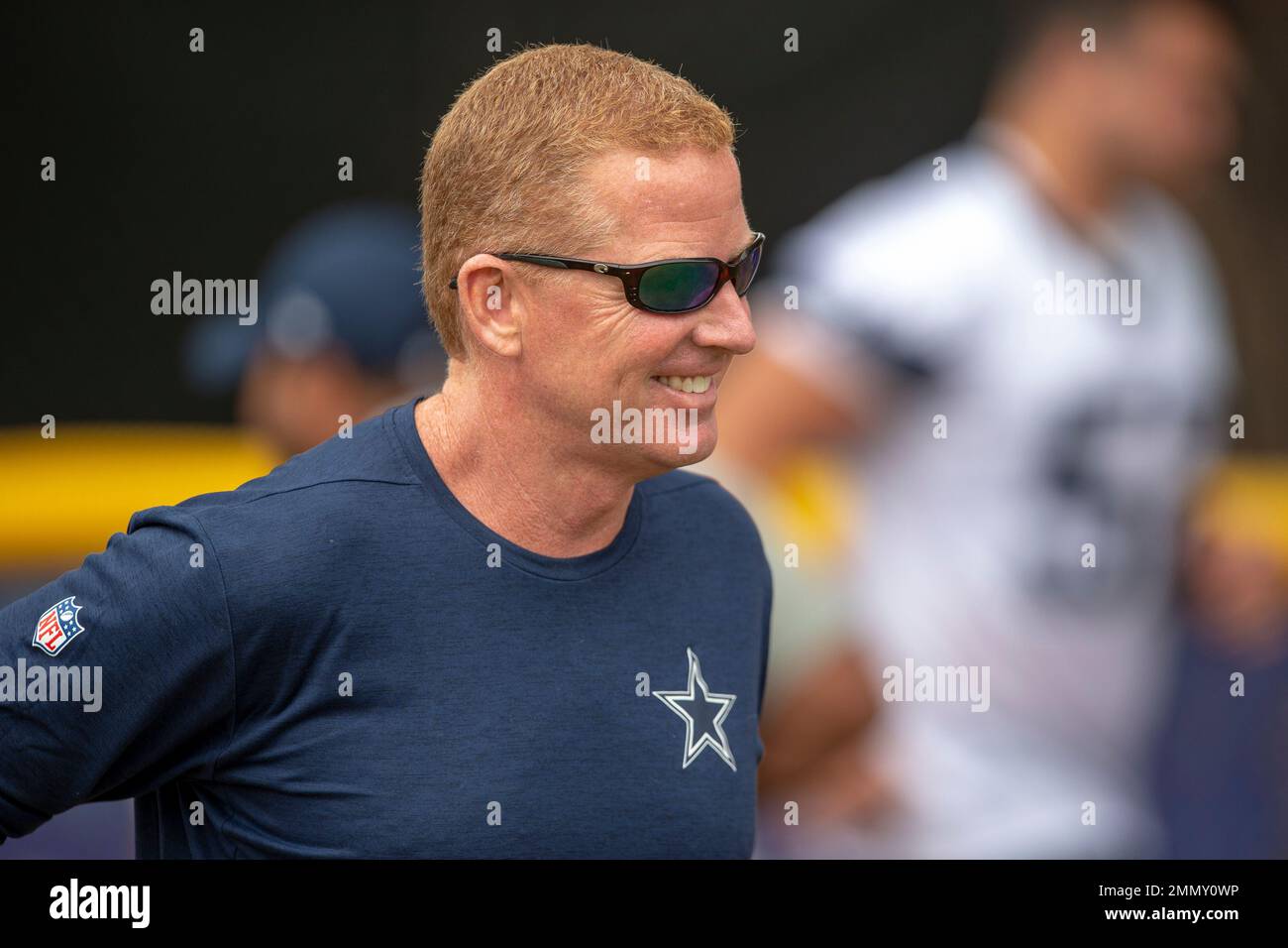 Dallas Cowboys head coach Jason Garrett takes the field for the start ...