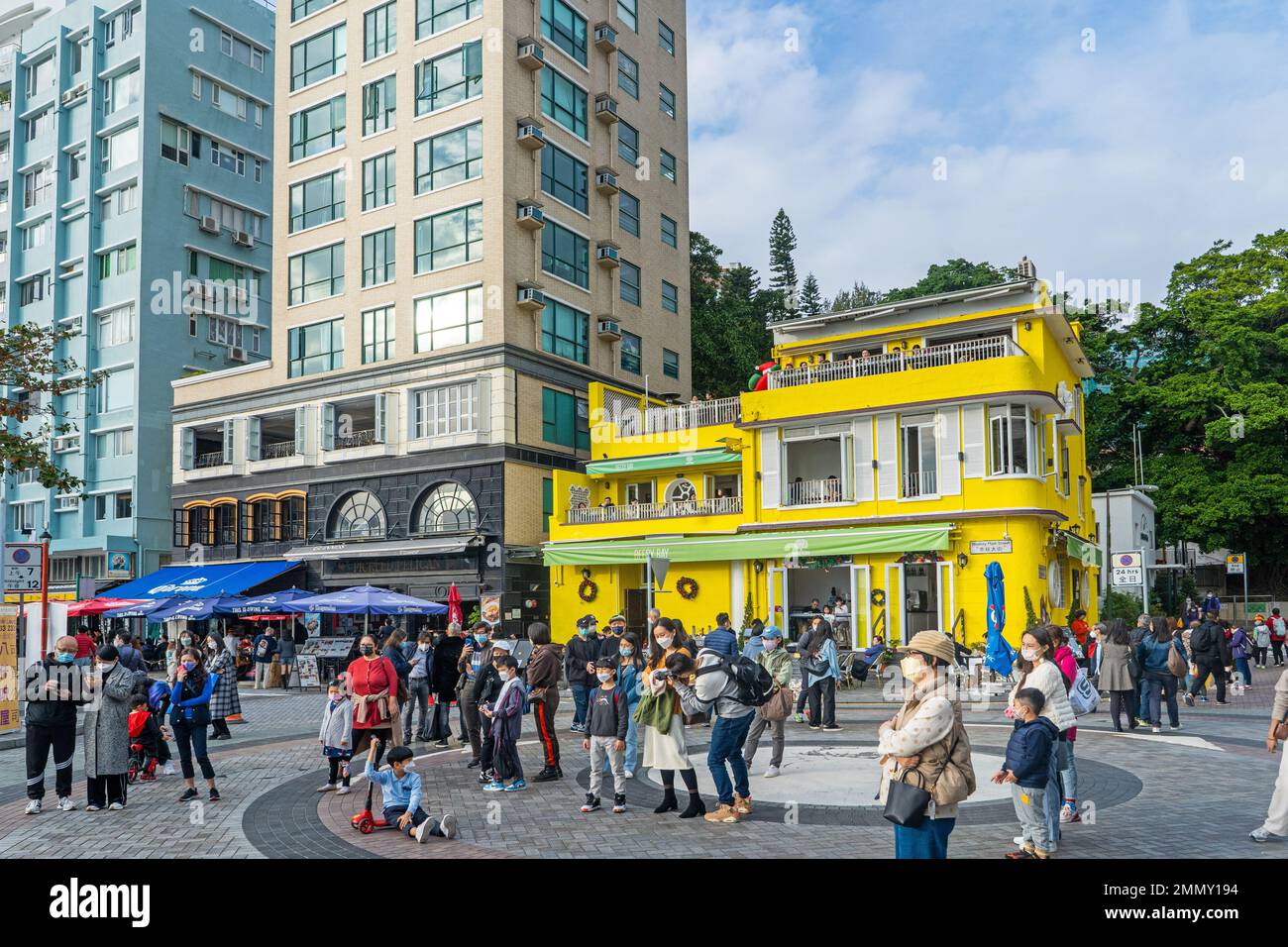 Stanley village, Hong Kong - Street scene, man playing guitar on the ...