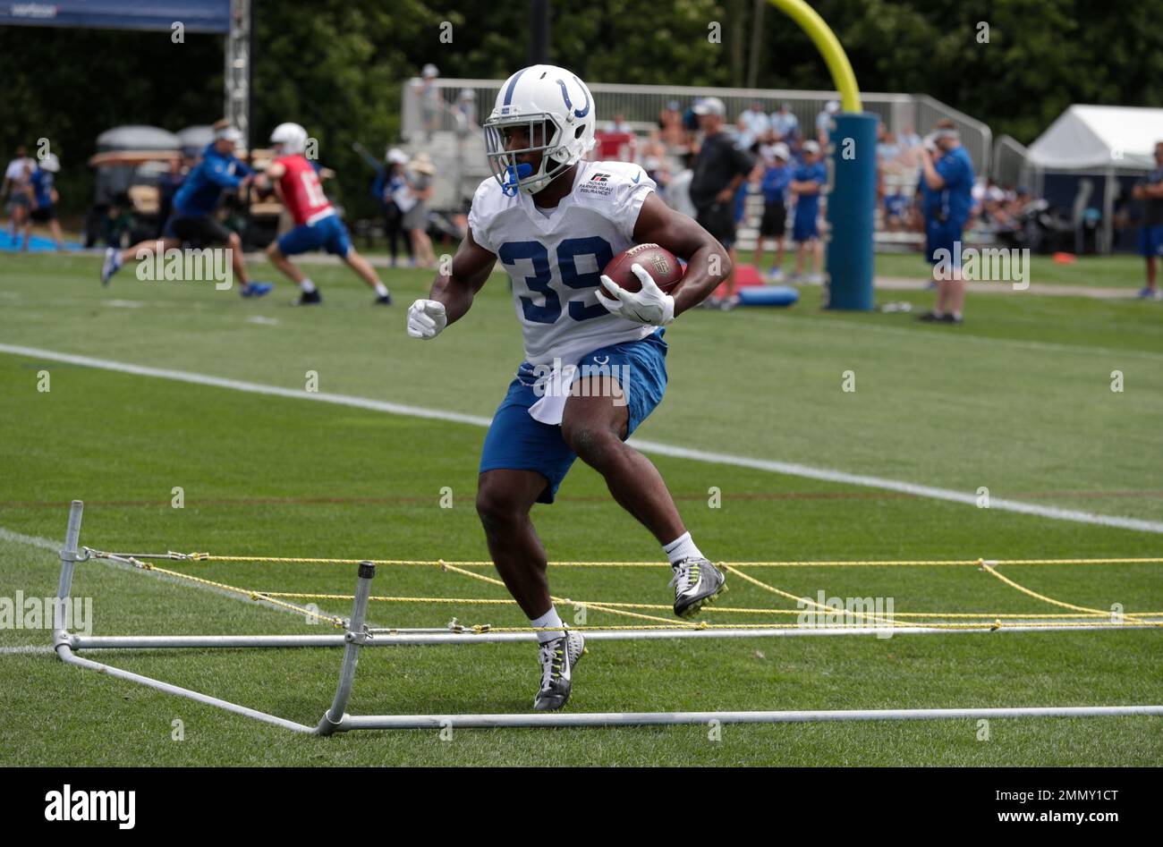 Indianapolis Colts running back Josh Ferguson (39) runs a drill on the ...
