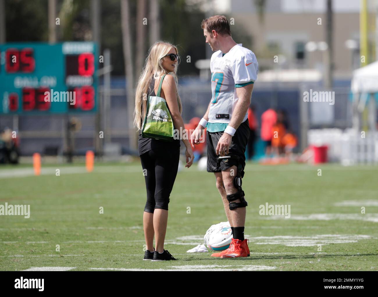 Miami Dolphins quarterback Ryan Tannehill talks with his wife Lauren at ...