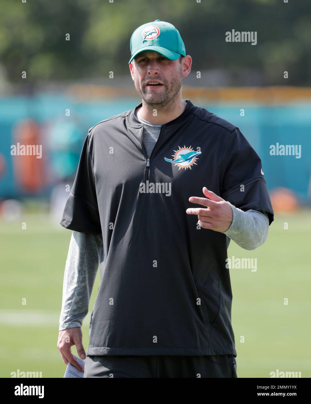 Miami Dolphins head coach Adam Gase walks on the field at the NFL ...