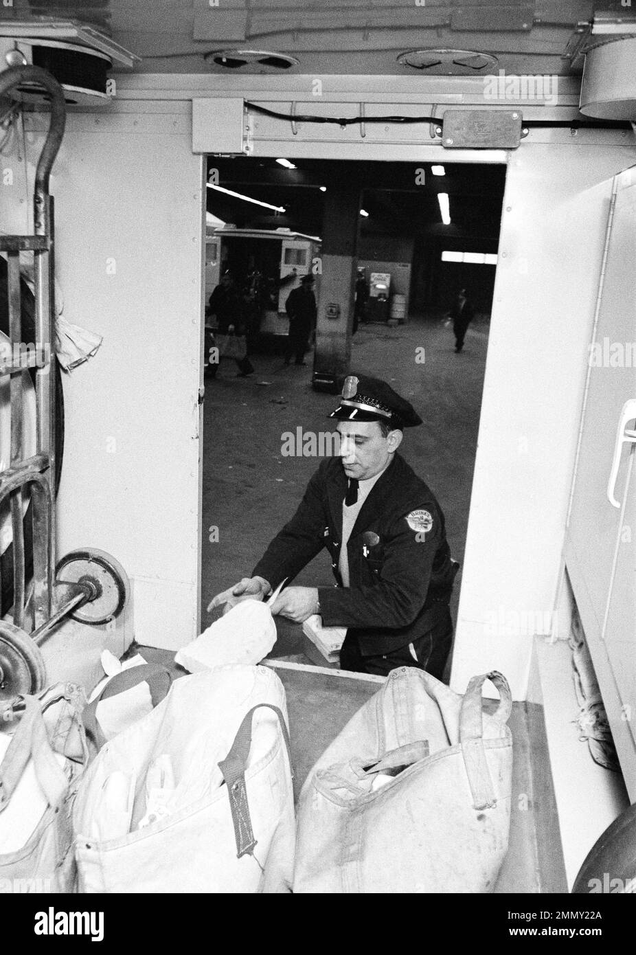 An unusual view from inside a Brink's armored truck as it is loaded in ...