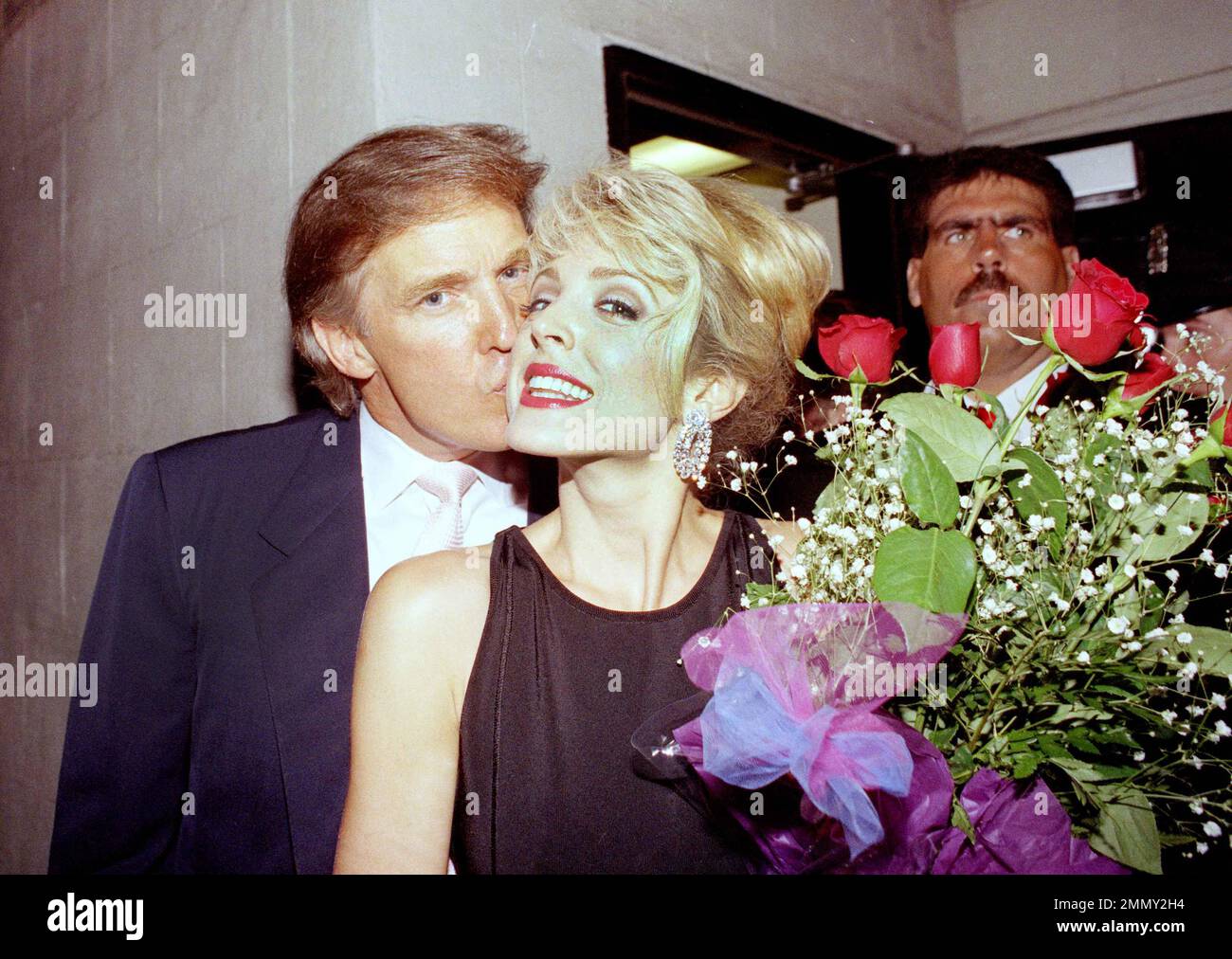 Marla Maples gets a kiss from Donald Trump at the stage door of the ...