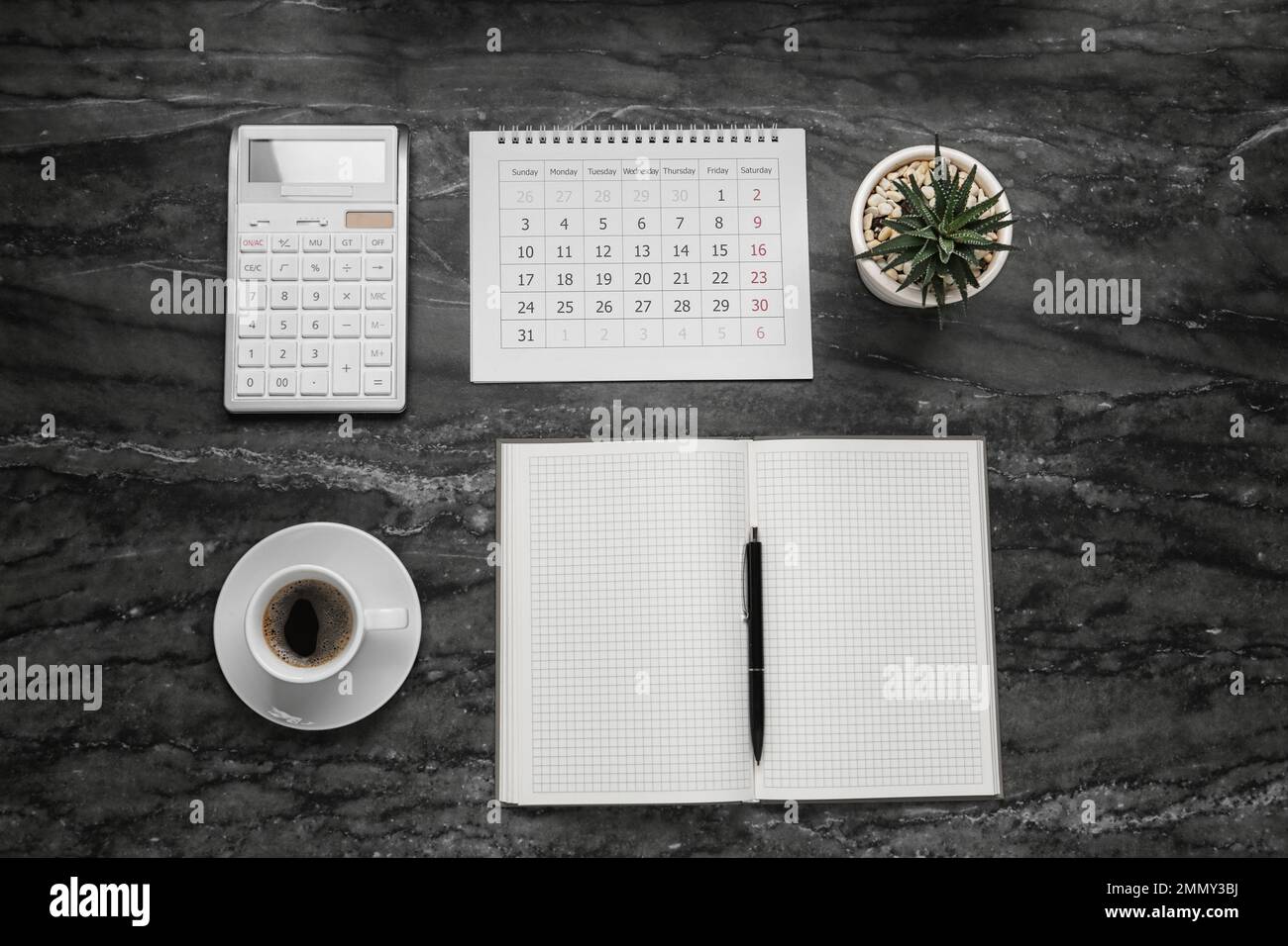 Flat lay composition with calendar on grey marble table Stock Photo - Alamy
