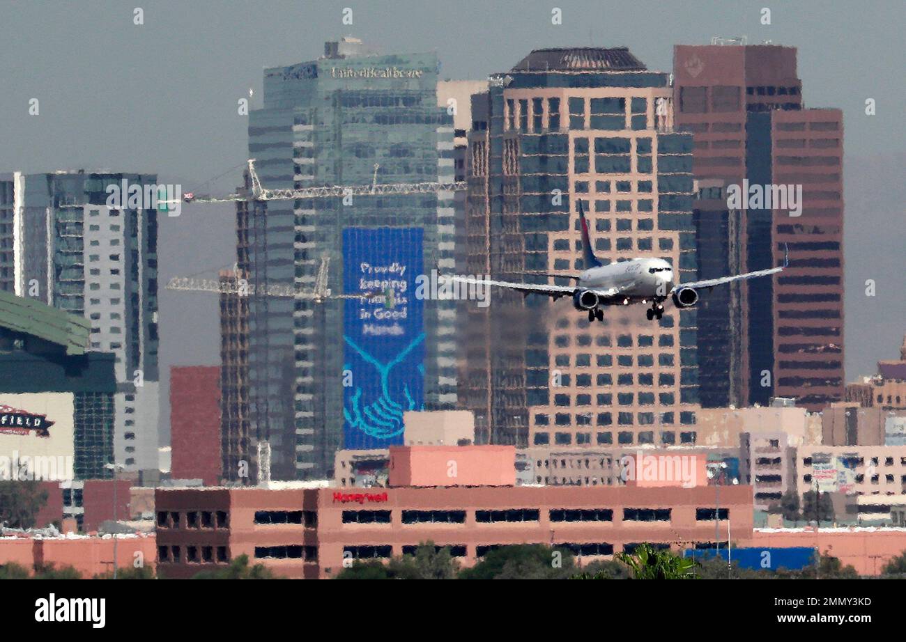 In this Monday, July 23, 2018 photo, heat ripples blur the downtown ...