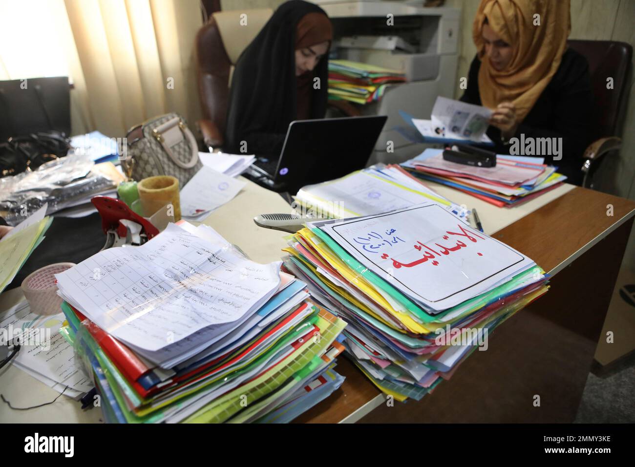 In this Tuesday, July 24, photo, thousands of jobs requests belonging ...