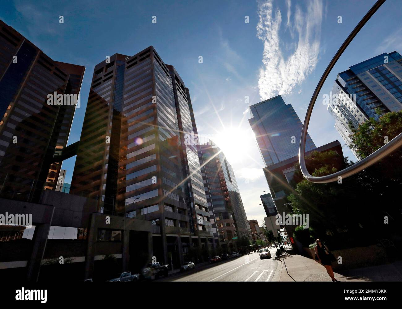 In this Monday, July 23, 2018 photo, the sun beats down on downtown ...